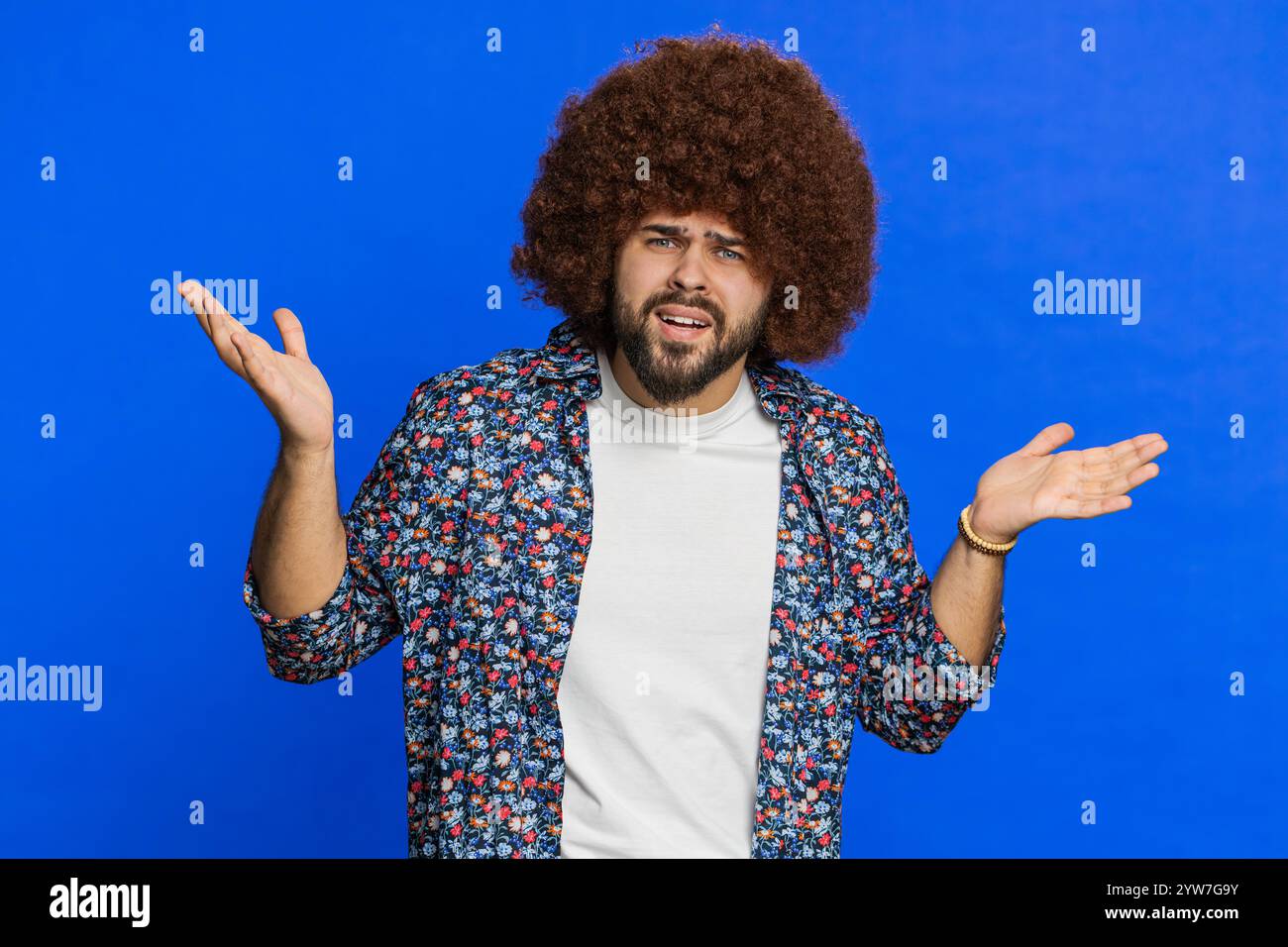 What. Why. Angry Caucasian man raising hands in indignant expression ...