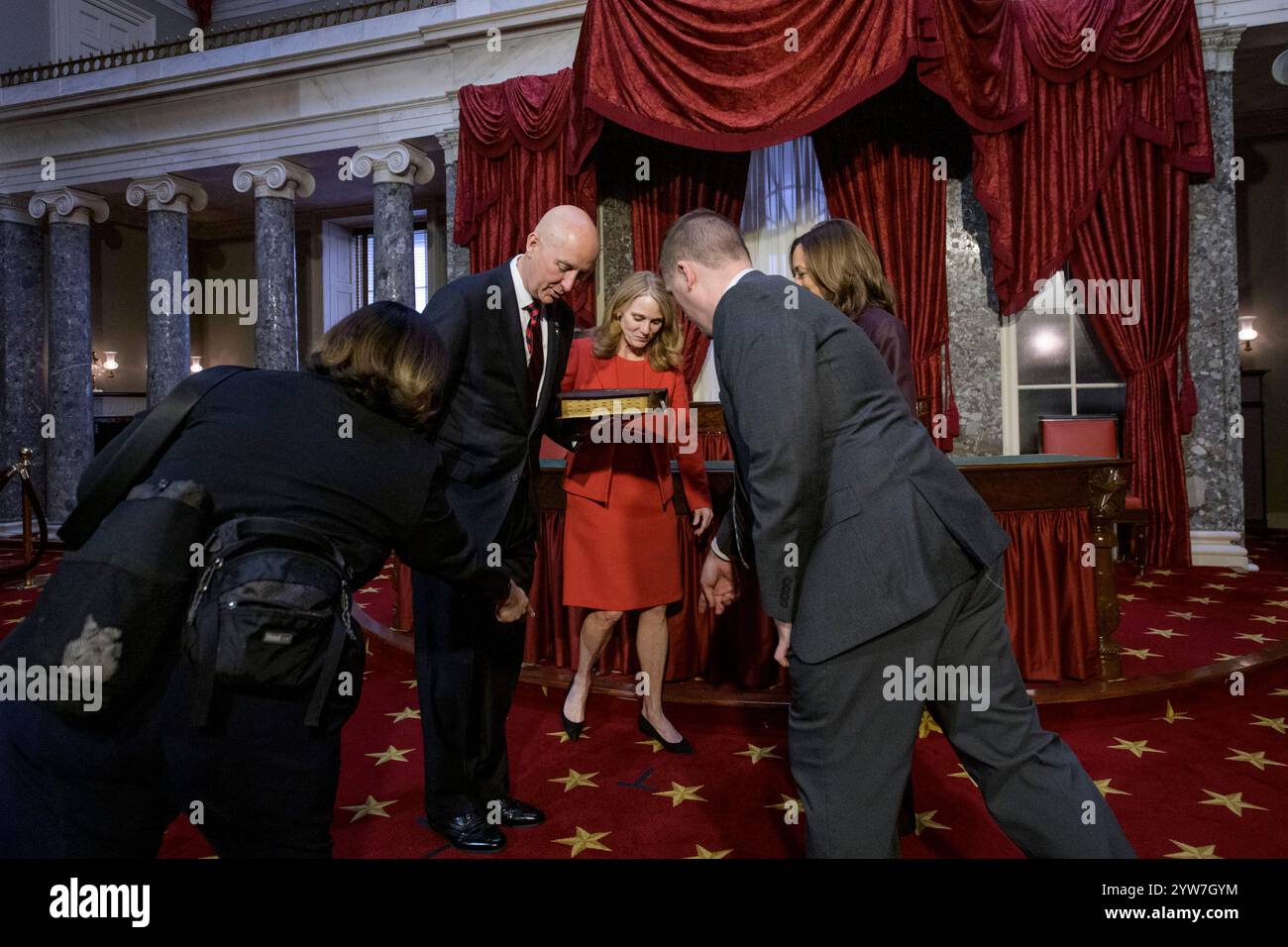 Vice President Kamala Harris, right, Sen. Pete Ricketts, R-Neb., second ...