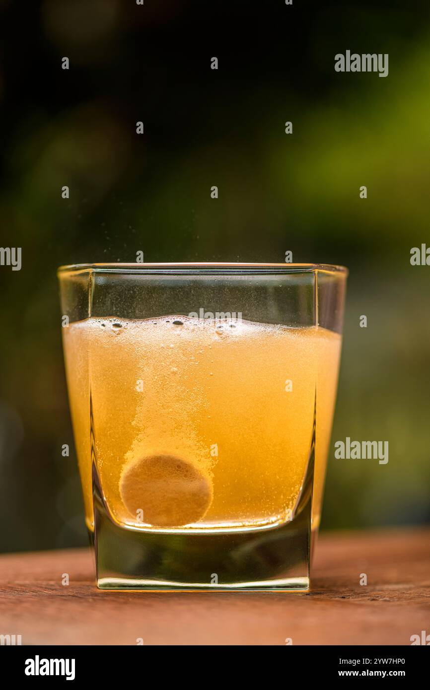 Effervescent vitamin tablet bubbles in hi-res stock photography and ...