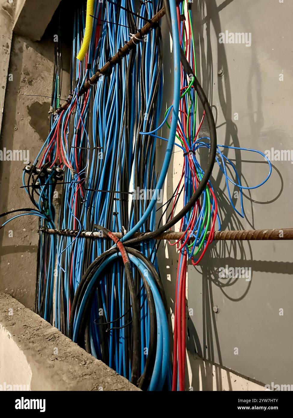 Electrical wires and cables being installed at a construction site ...