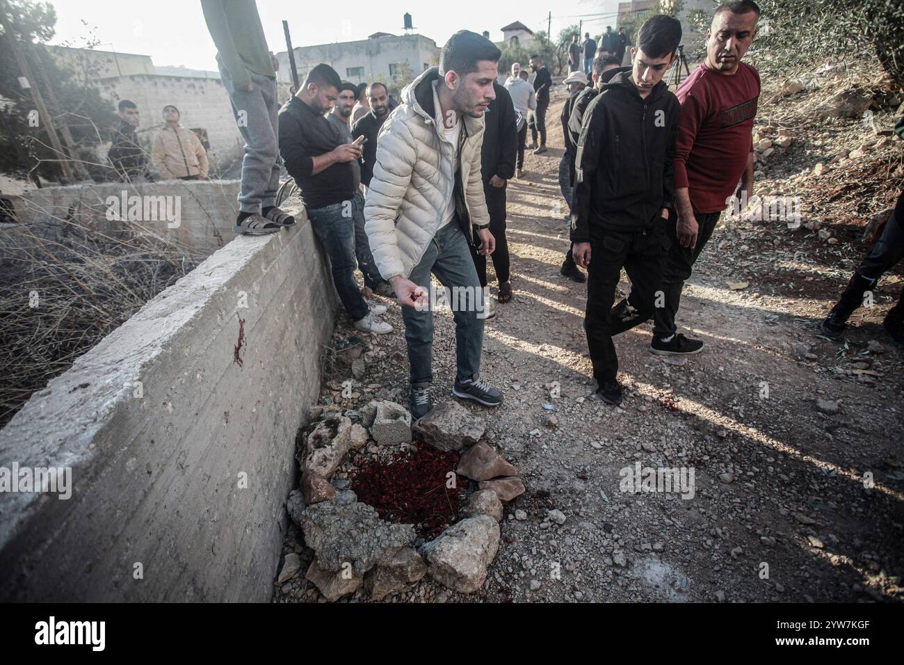 Tubas, Palestine. 09th Dec, 2024. Relatives and friends of the martyrs ...