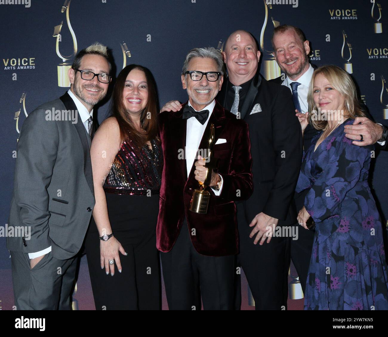 Beverly Hills, USA. 8, December, 2024. Pictured left to right, Joe Cipriano - center, and guests ...