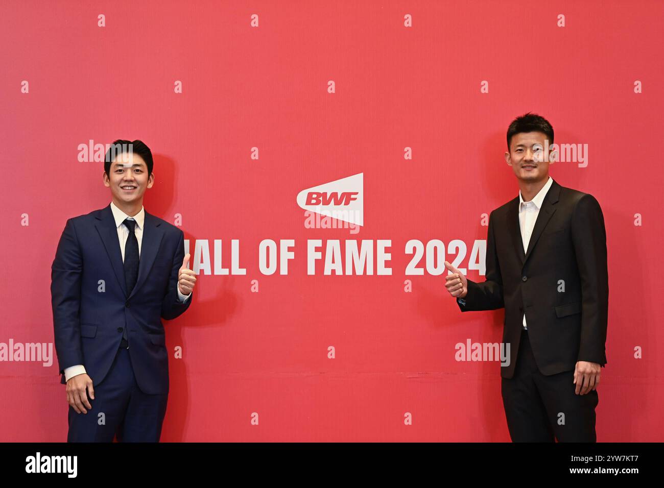 Hangzhou. 10th Dec, 2024. Chen Long (R) of China and Lee Yong Dae of ...