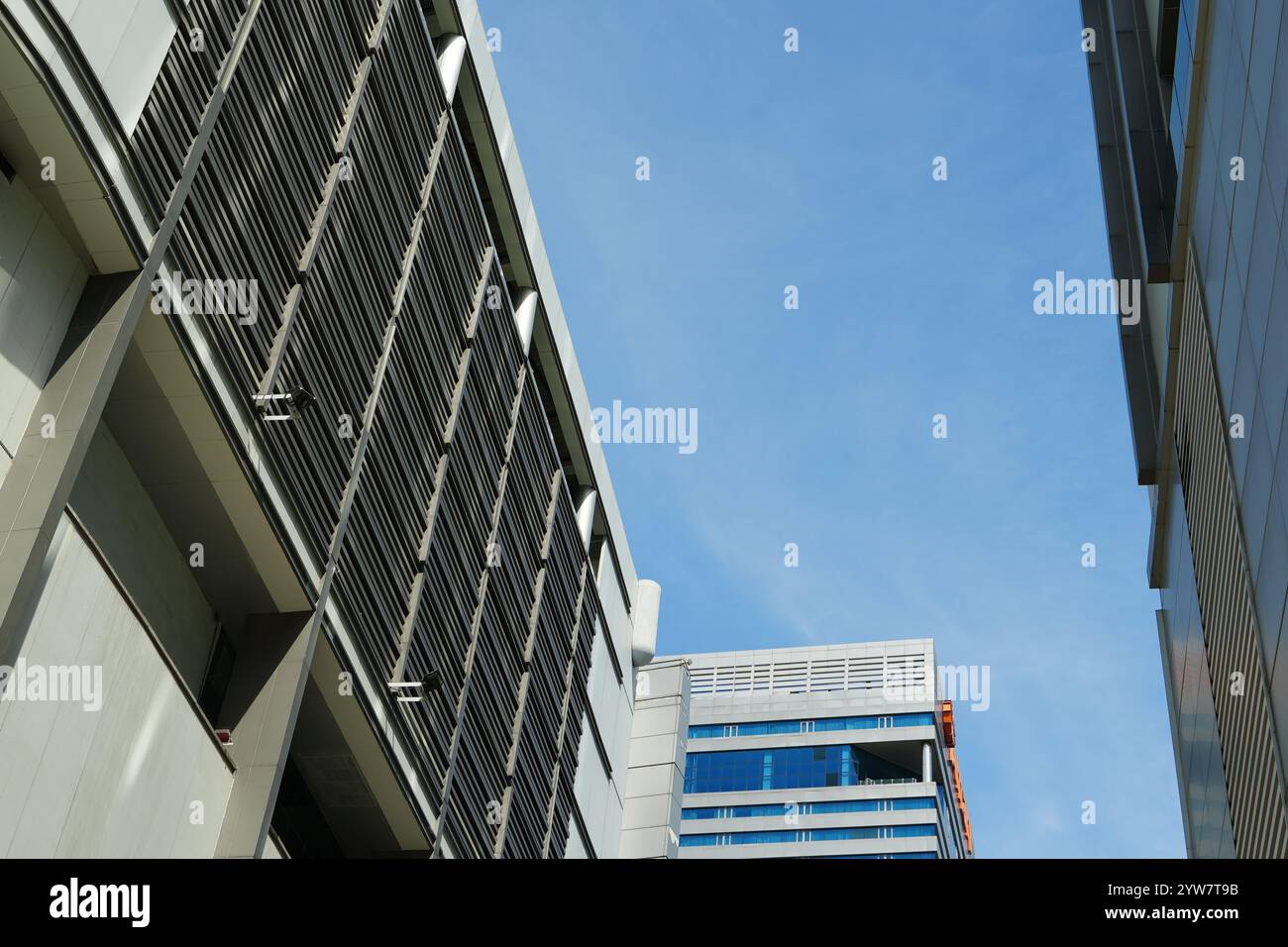 Architecture of building corner with blue sky background in Bangkok ...