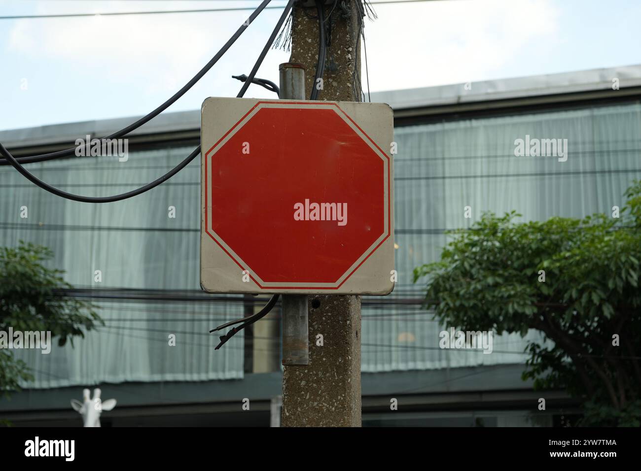 old warning blank sign on the side of the road, red caution sign mock ...