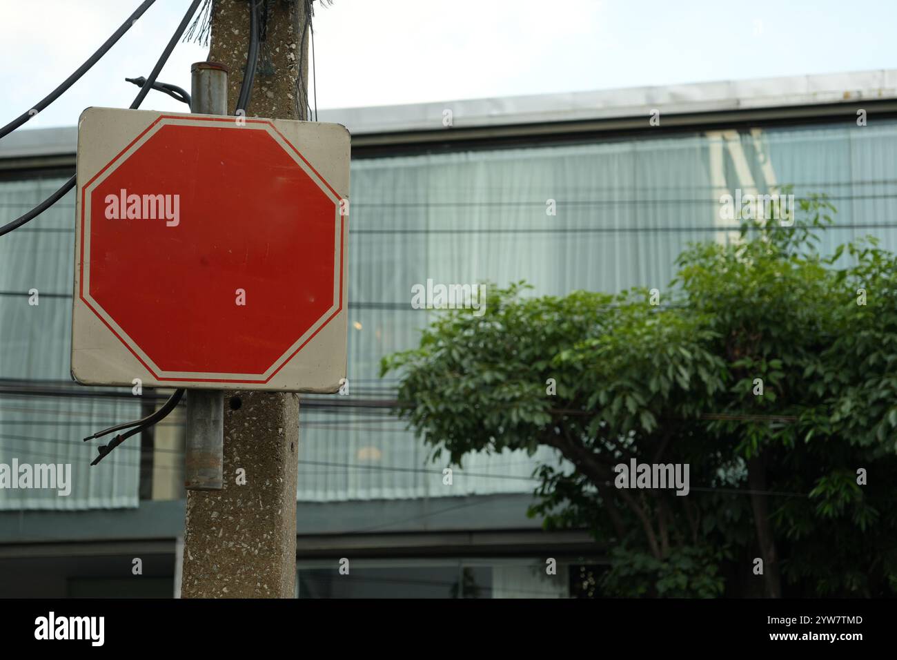 old warning blank sign on the side of the road, red caution sign mock ...