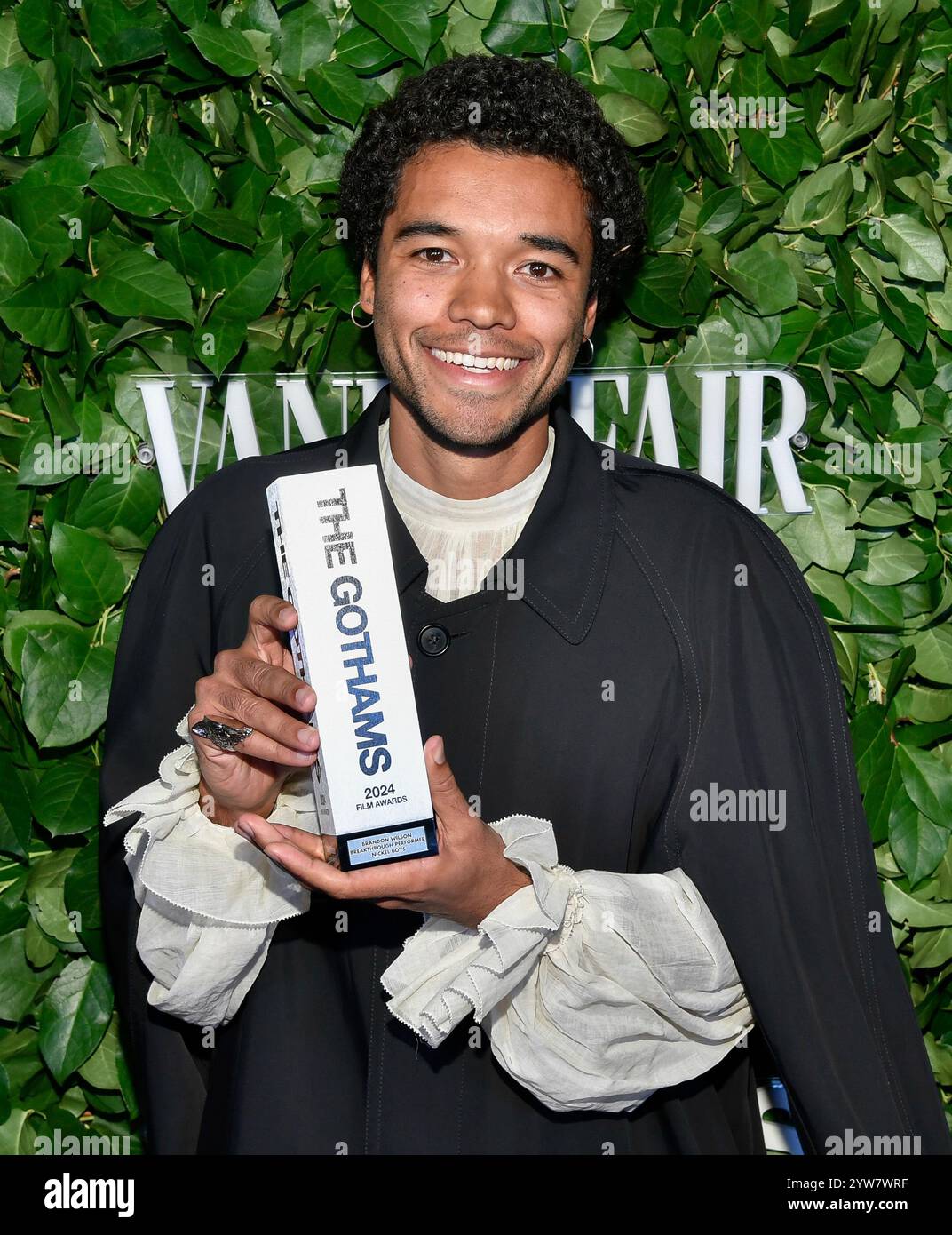 Actor Brandon Wilson poses with the breakthrough performer award for ...