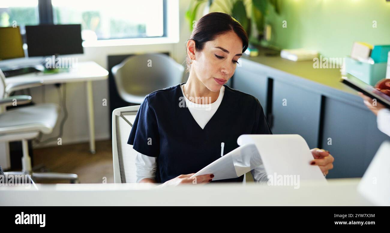 Dental office receptionist secretary employee woman female working job ...