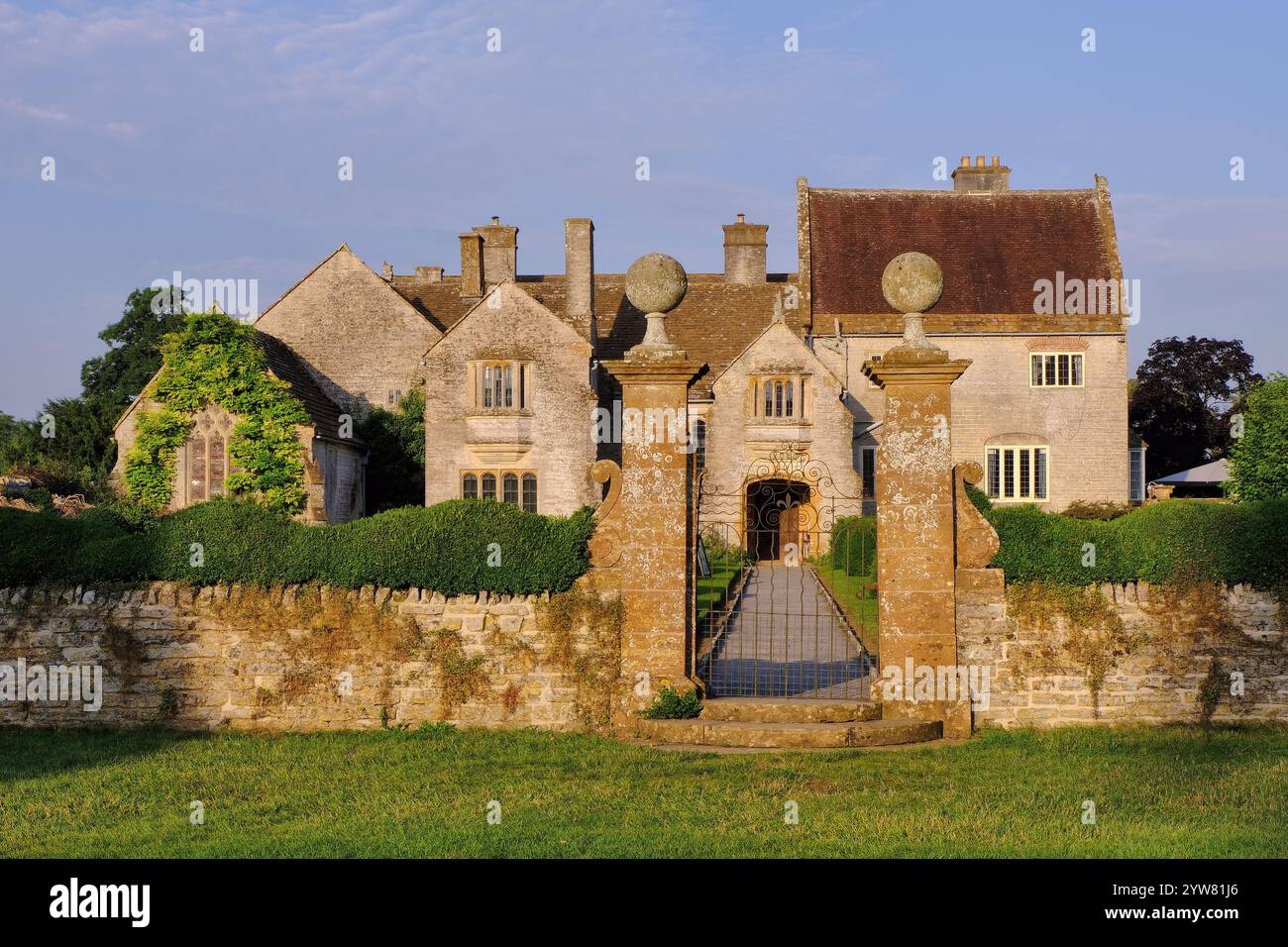 Lytes Cary: Lytes Cary Manor, stone fence, gate and garden soon after ...