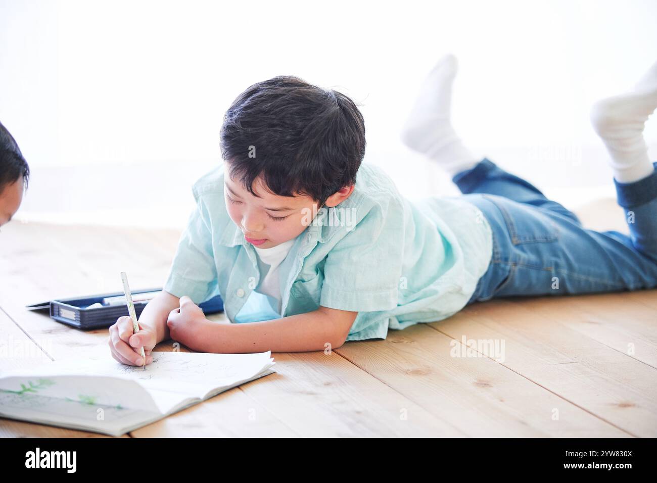 Boy with pen Stock Photo - Alamy