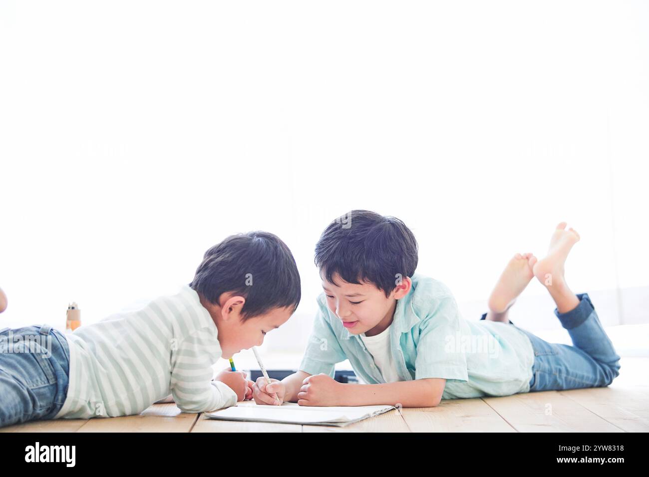 Boy with pen Stock Photo - Alamy