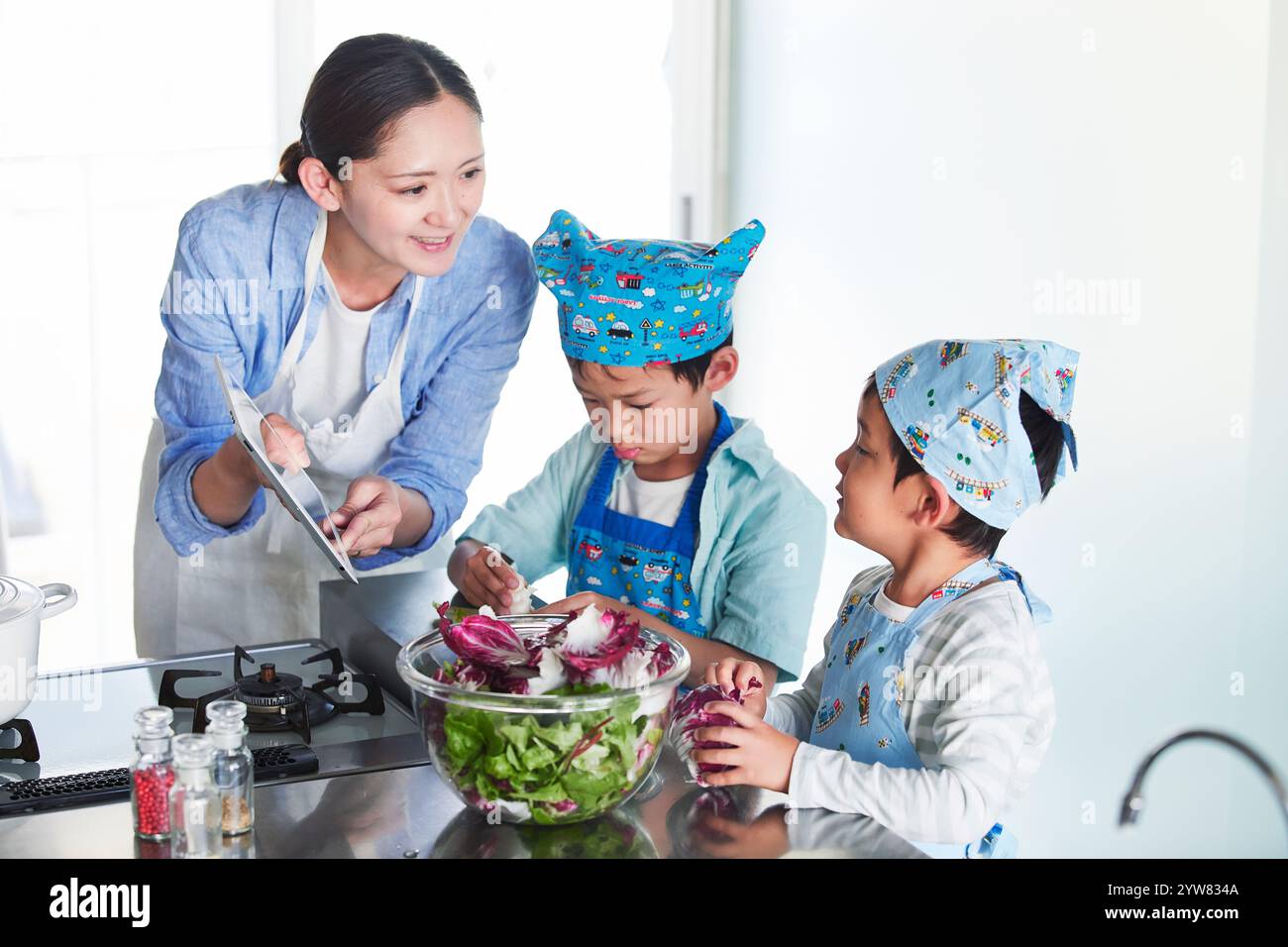 Woman teach son homework hi-res stock photography and images - Alamy