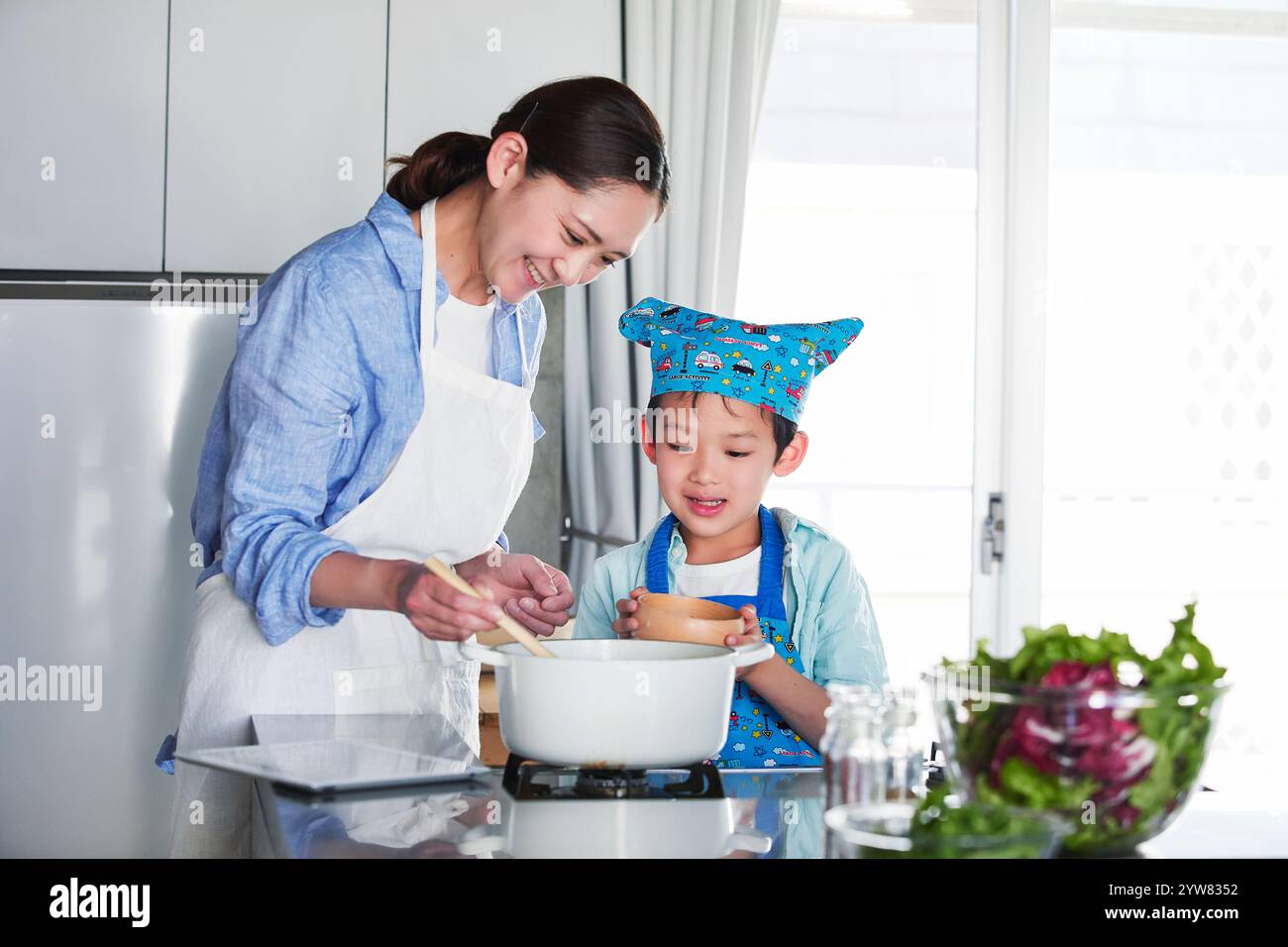 Woman teach son homework hi-res stock photography and images - Alamy