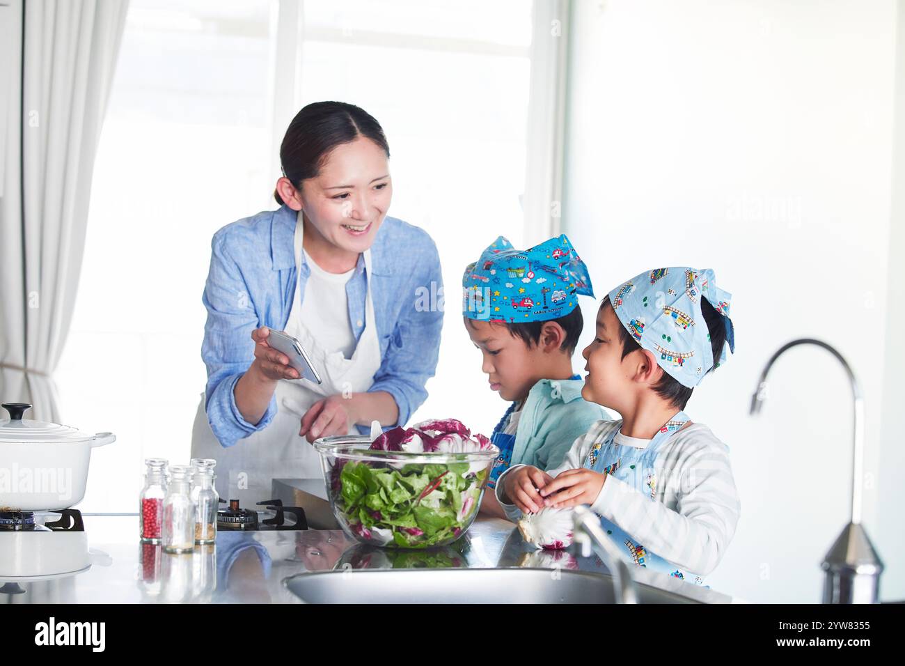 Woman teach son homework hi-res stock photography and images - Alamy