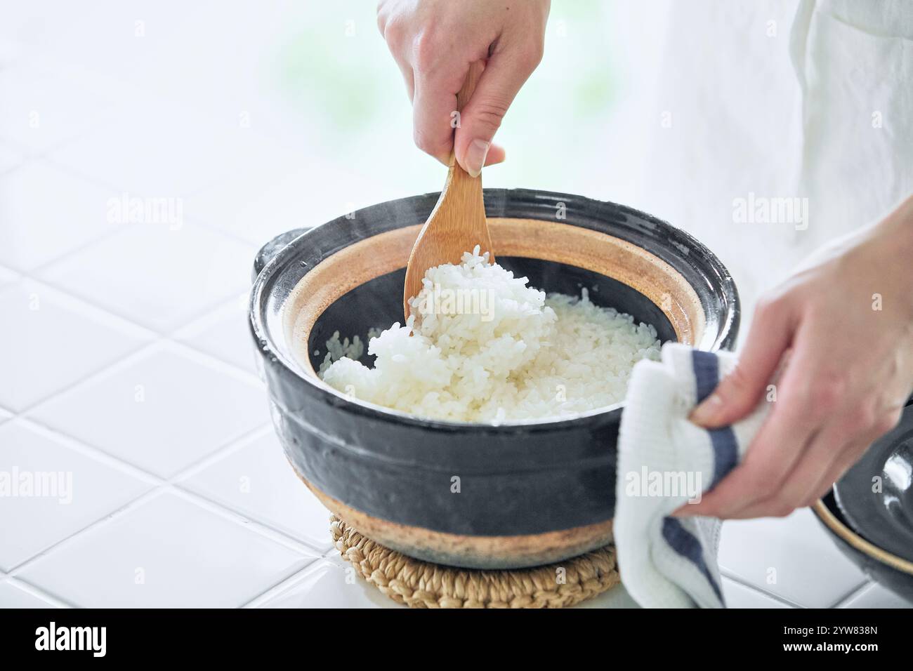 Cooking rice in pot hi-res stock photography and images - Alamy