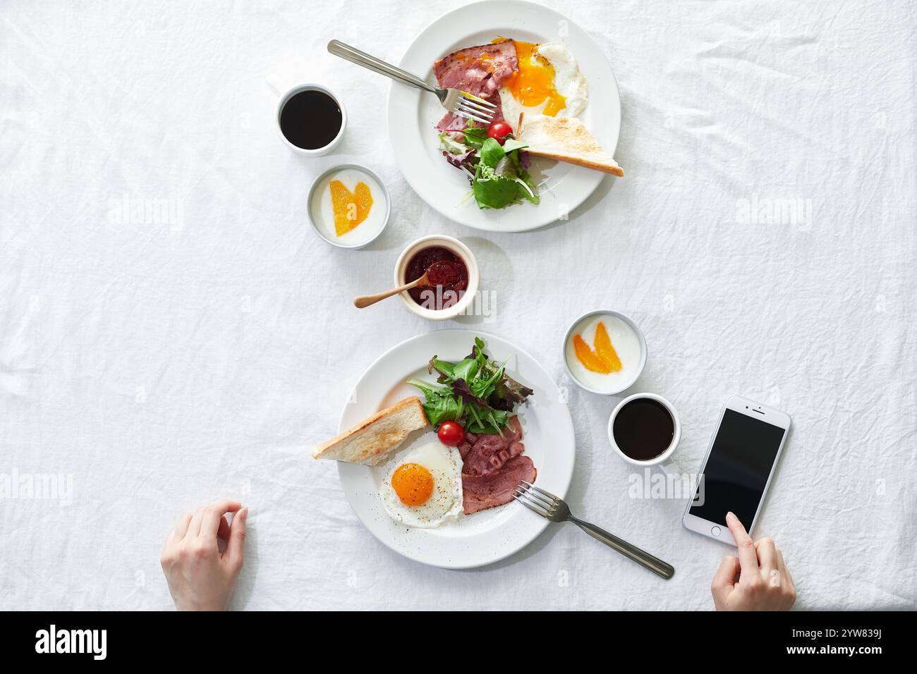 Dining table with food lined up Stock Photo - Alamy
