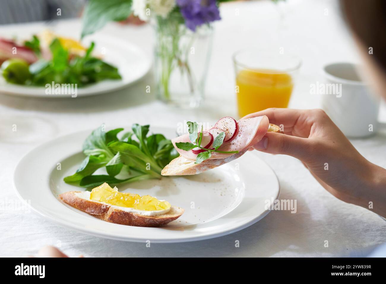 Dining table with food lined up Stock Photo - Alamy