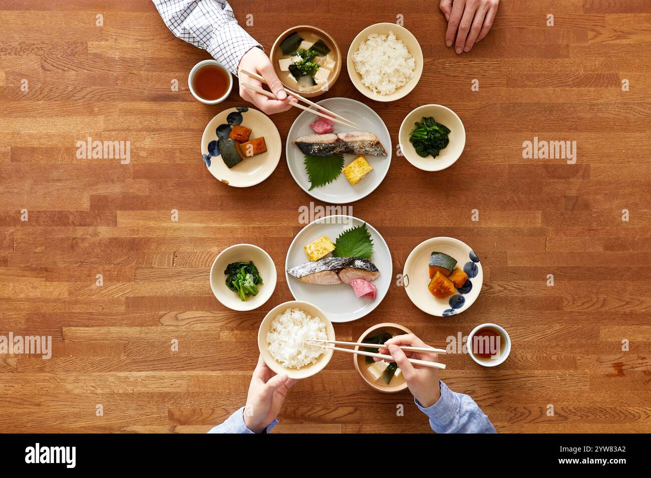Dining table with food lined up Stock Photo - Alamy