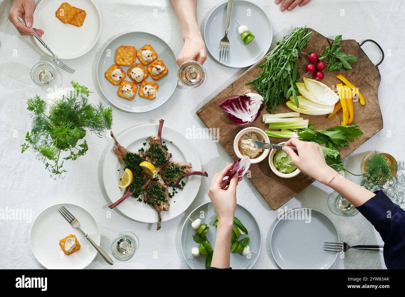 Dining table with food lined up Stock Photo - Alamy