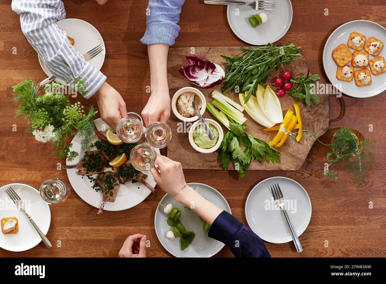 Dining table with food lined up Stock Photo - Alamy