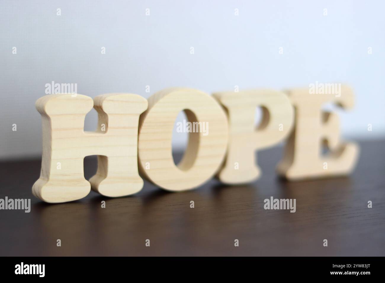 Wooden word blocks to represent the letters HOPE Stock Photo - Alamy