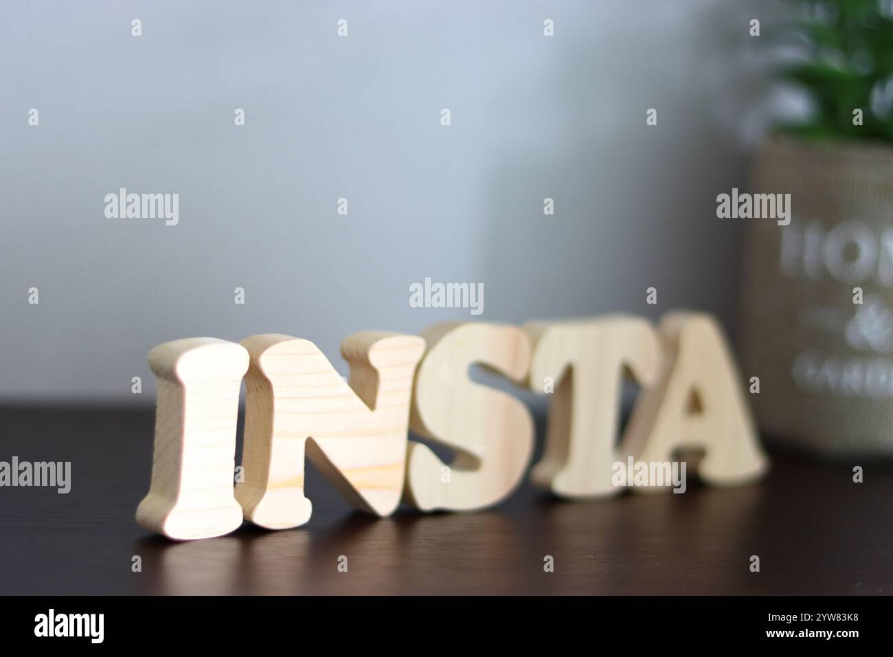 Wooden word blocks representing the letters INSTA Stock Photo - Alamy