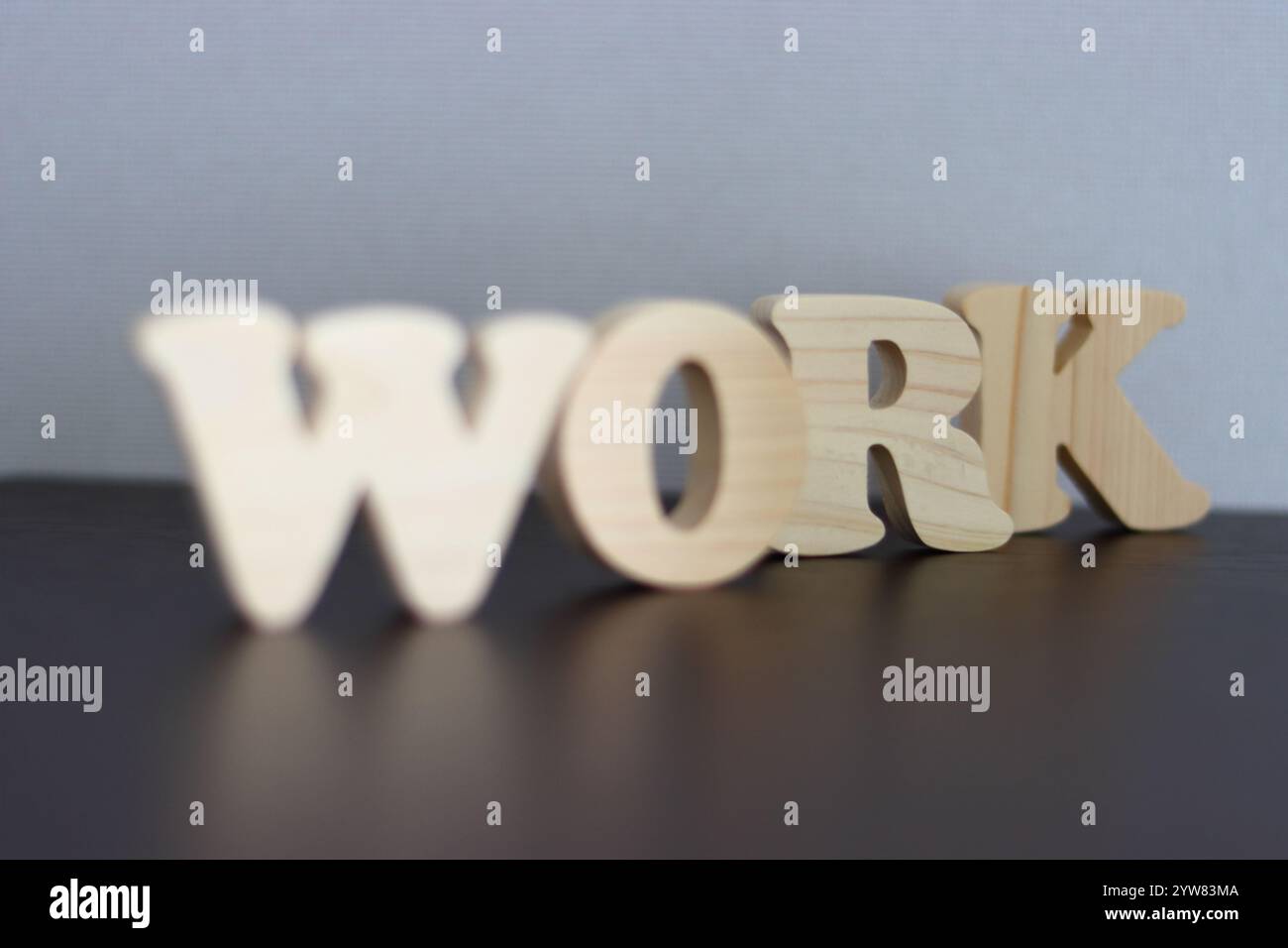Wooden word blocks representing the word WORK Stock Photo - Alamy