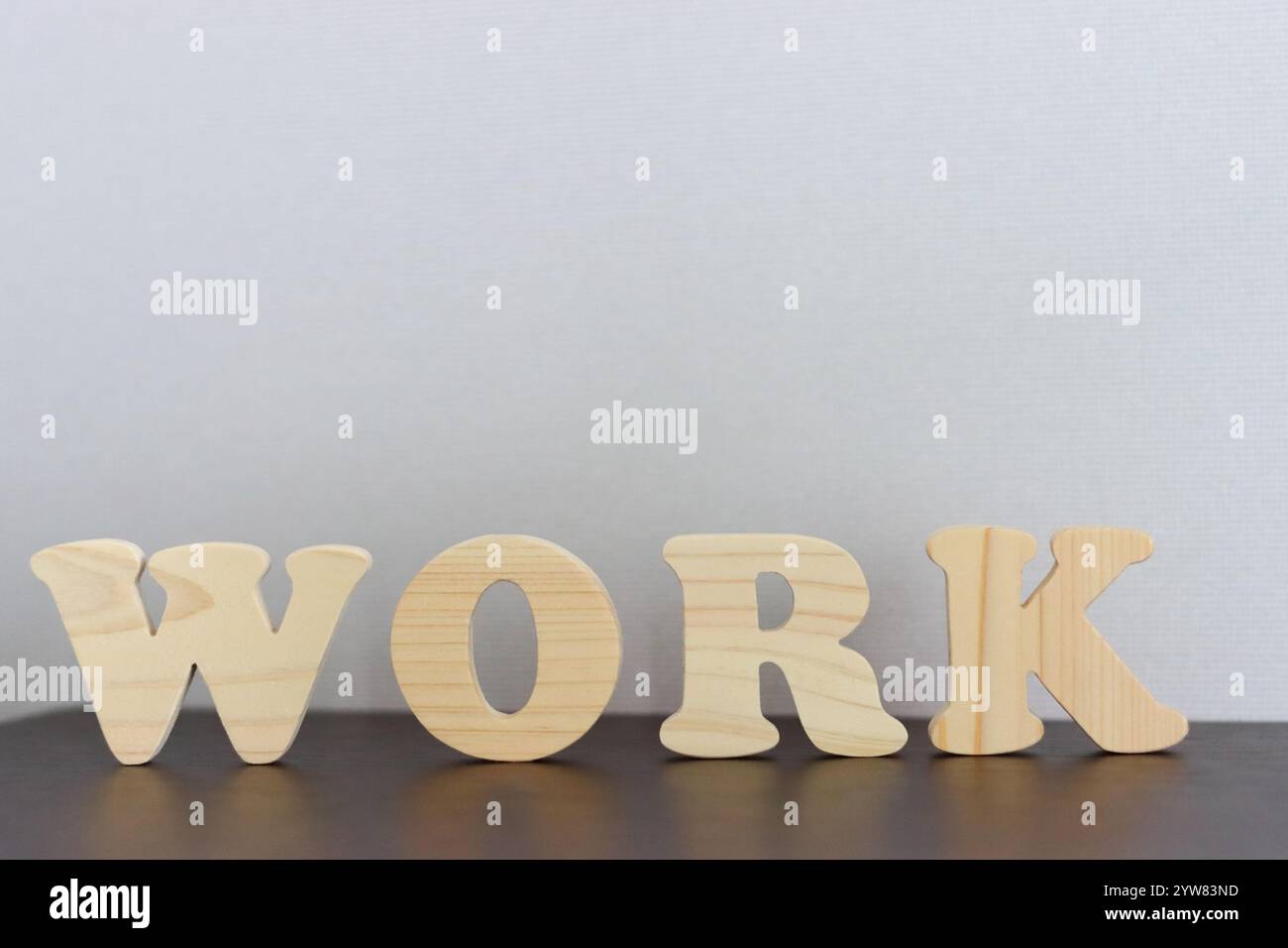 Wooden word blocks representing the word WORK Stock Photo - Alamy