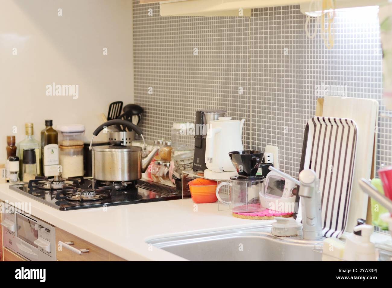 Clean and tidy kitchen, albeit with a lived-in feel Stock Photo - Alamy