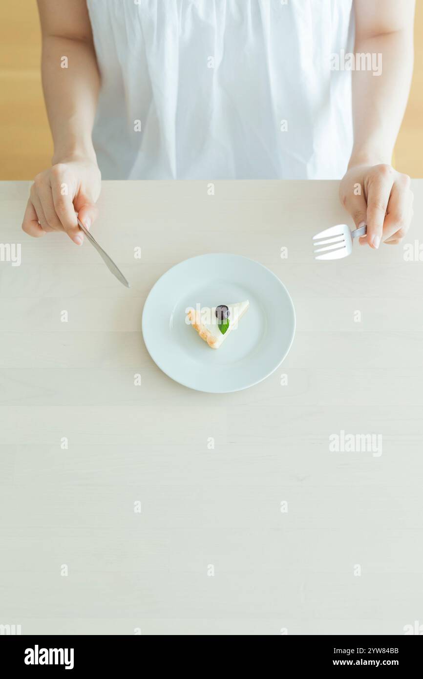 Cheesecake woman hi-res stock photography and images - Alamy