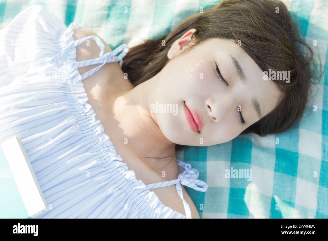 Young woman taking nap hi-res stock photography and images - Alamy