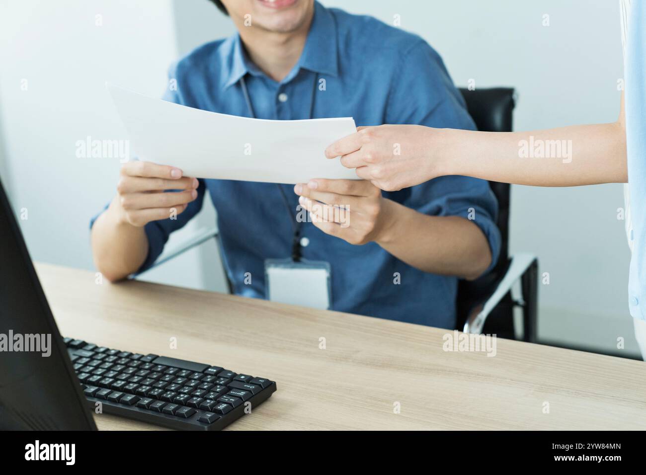 Handing over documents hi-res stock photography and images - Alamy