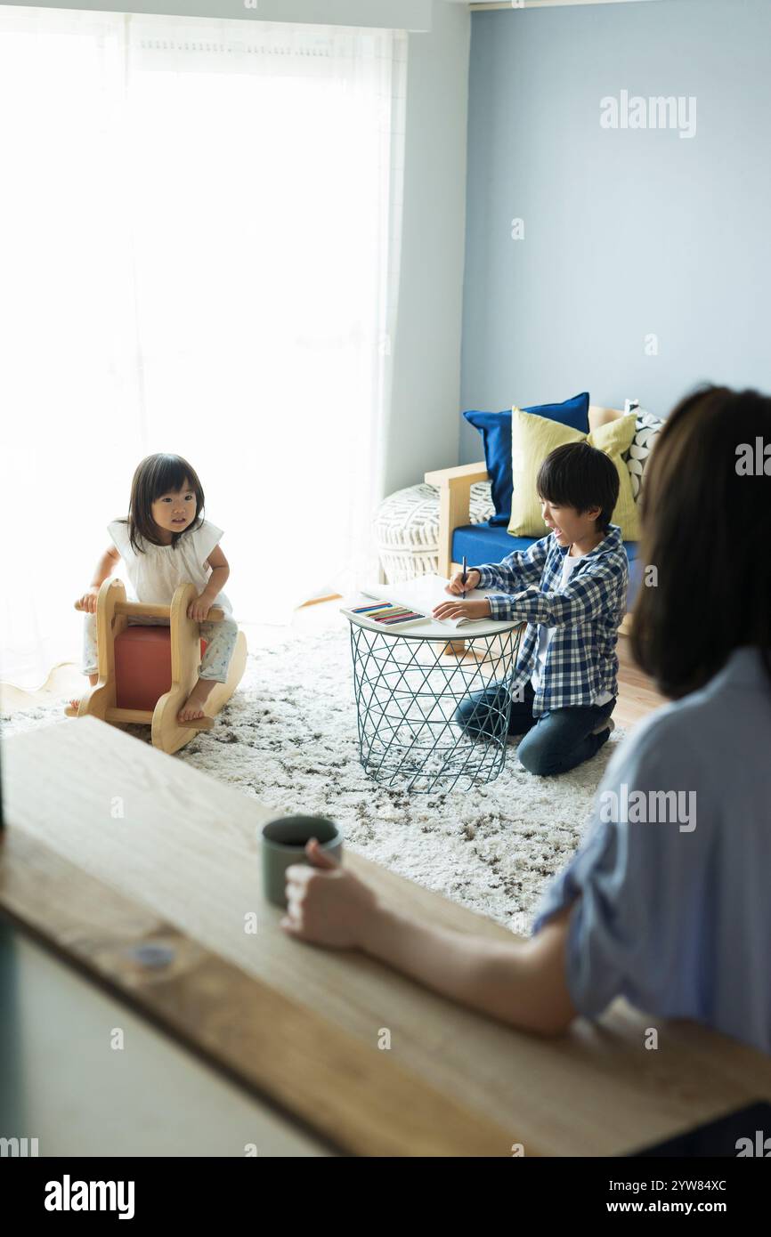 Infant woman ride play hi-res stock photography and images - Alamy