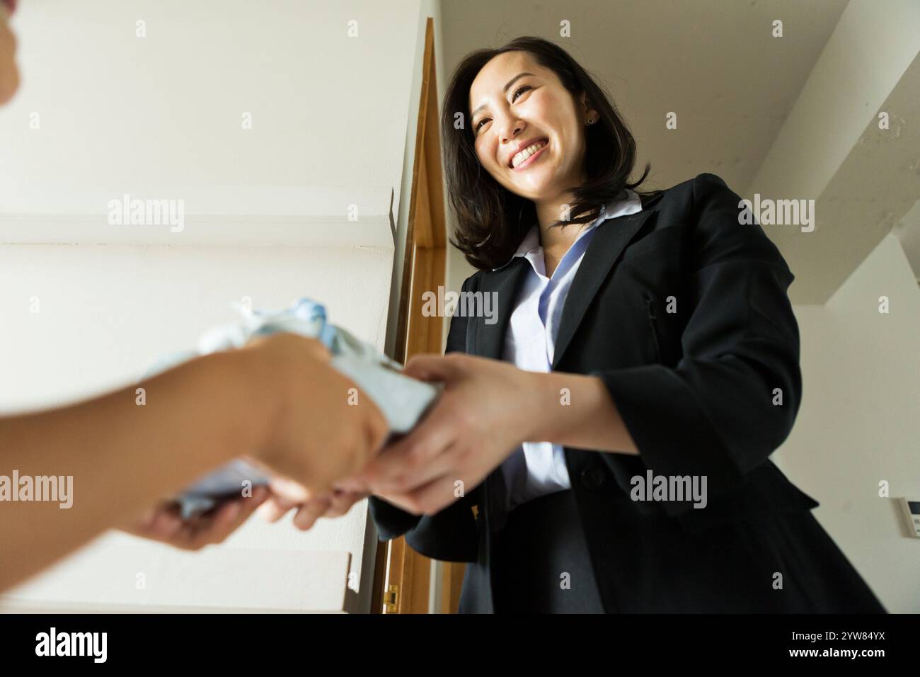 Handing boxes hi-res stock photography and images - Alamy