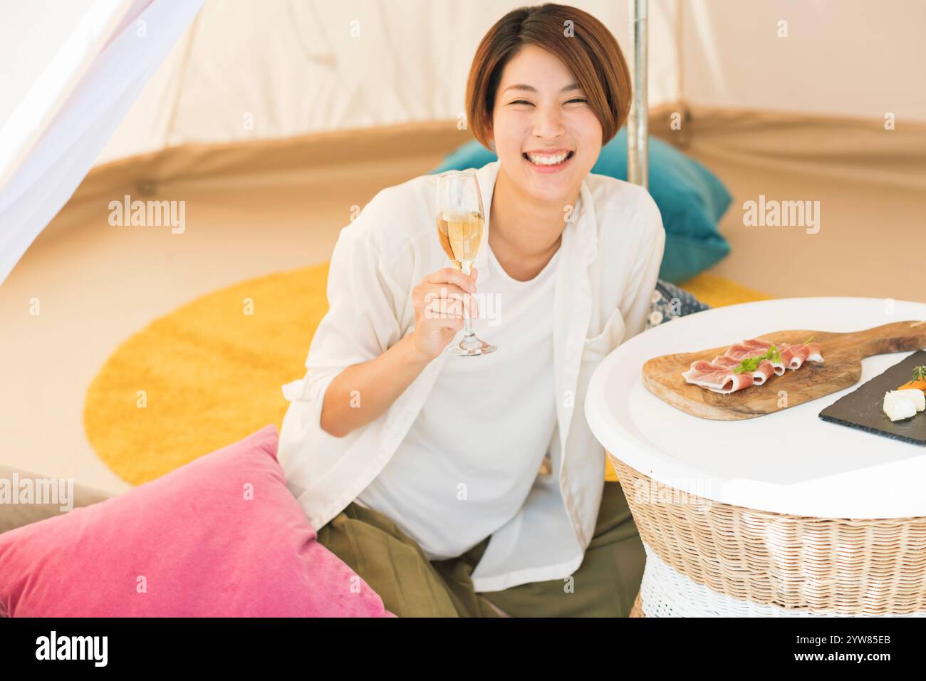 Woman in her 20s glamping Stock Photo - Alamy