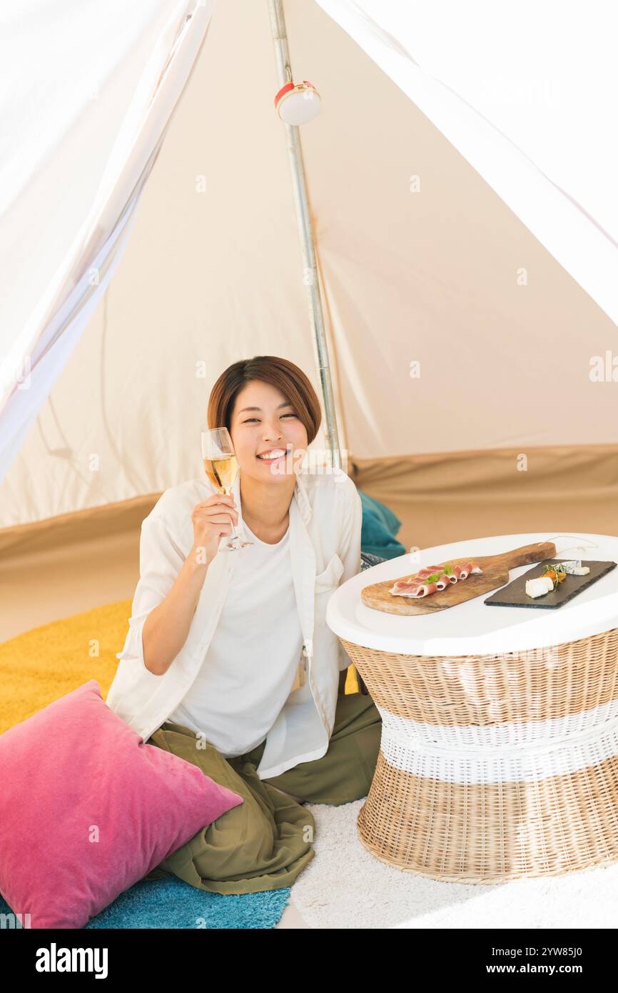 Woman in her 20s glamping Stock Photo - Alamy
