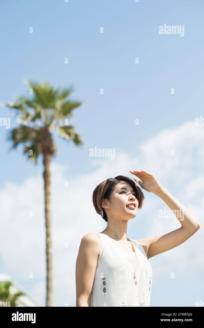 Person looking up at sky and trees hi-res stock photography and images ...
