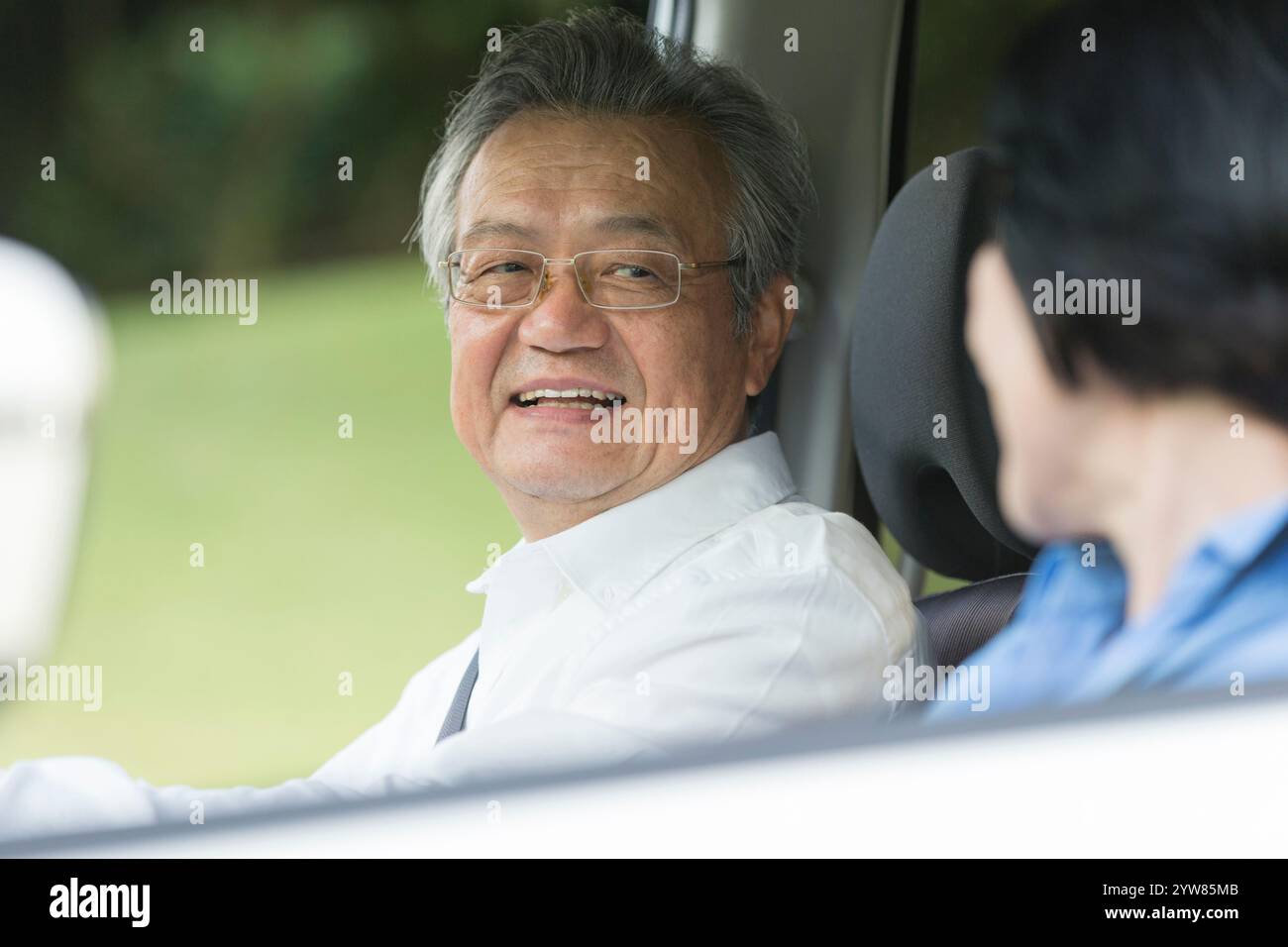 Senior couple enjoying a drive Stock Photo - Alamy