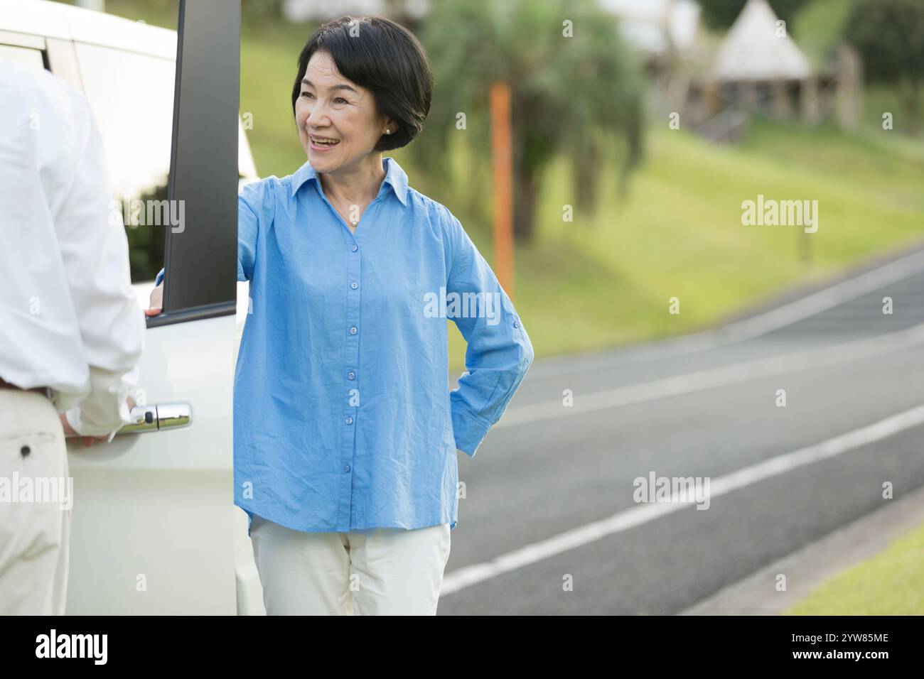 Senior woman enjoying a drive Stock Photo - Alamy