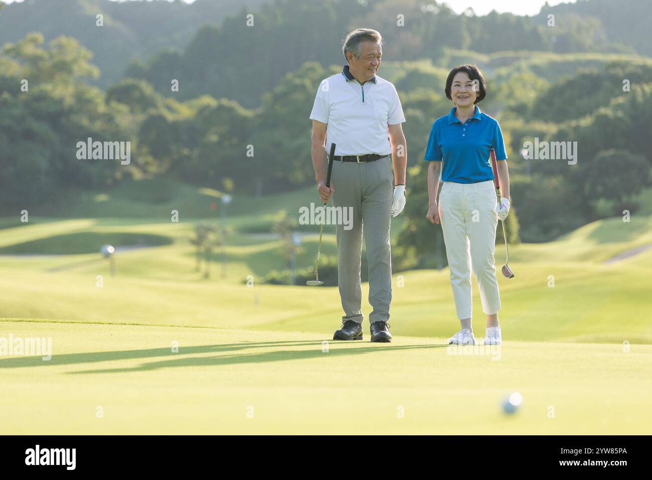 Walking on golf course hi-res stock photography and images - Alamy