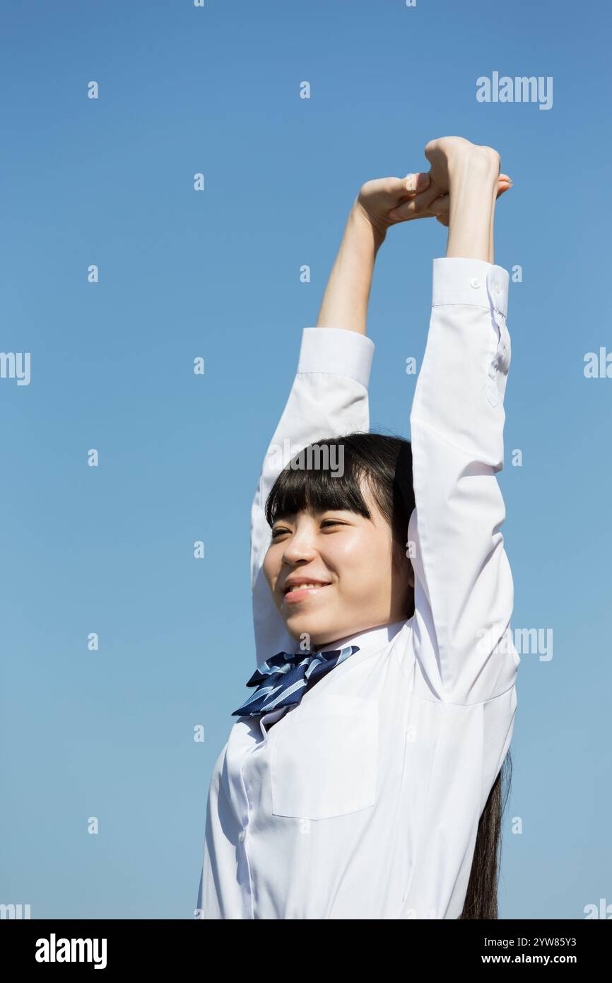 High school girls stretching Stock Photo - Alamy