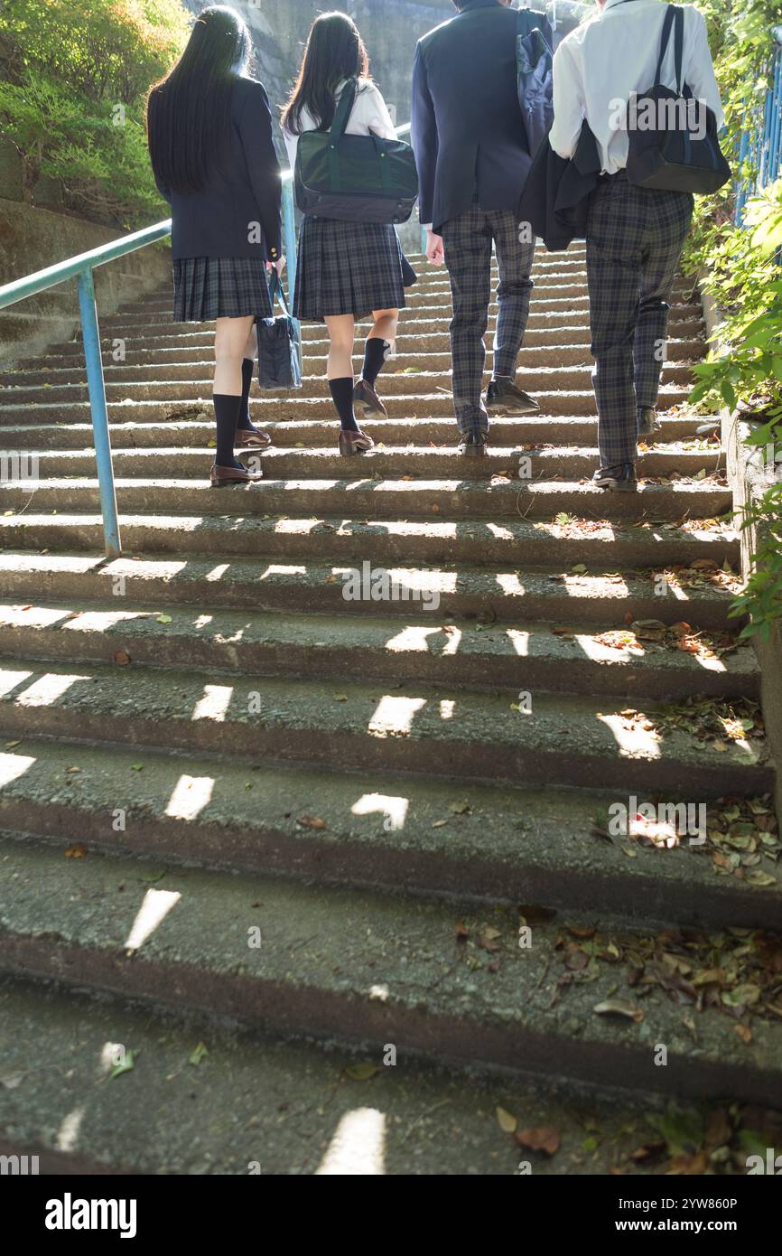 High school students on their feet on their way to school Stock Photo ...