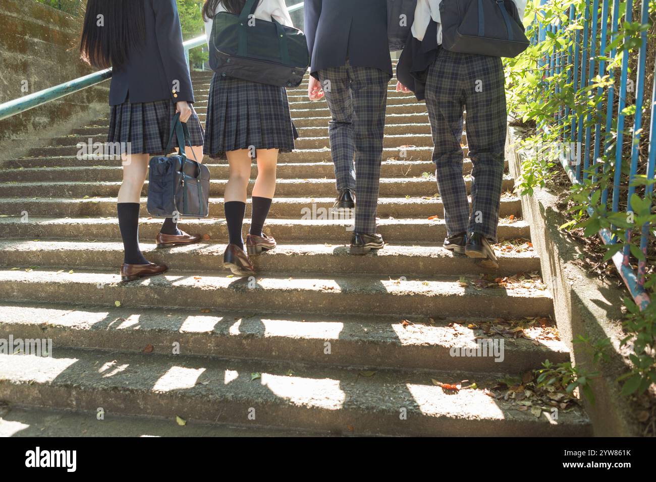 High school students on their feet on their way to school Stock Photo ...
