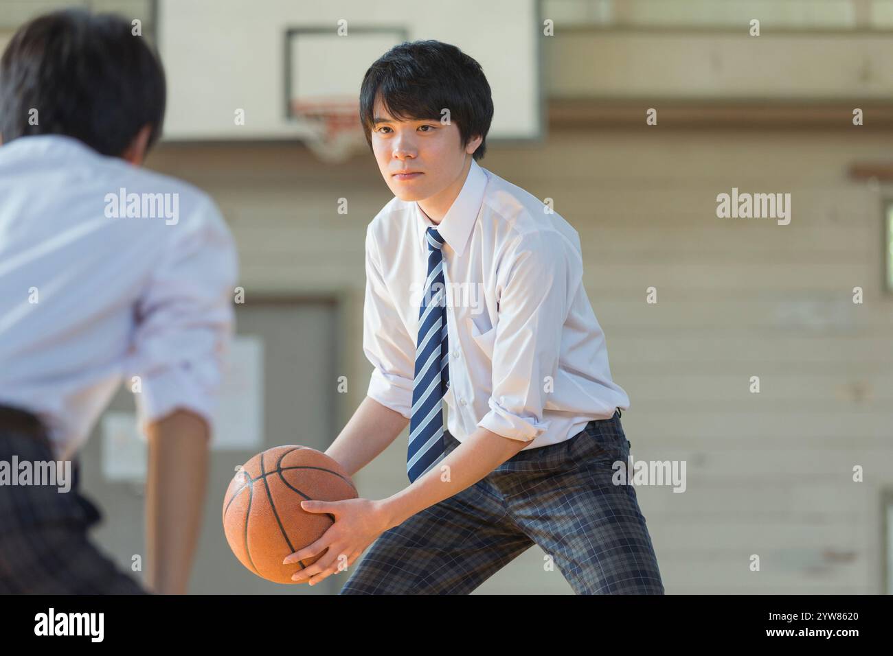 High school boys playing basketball Stock Photo - Alamy