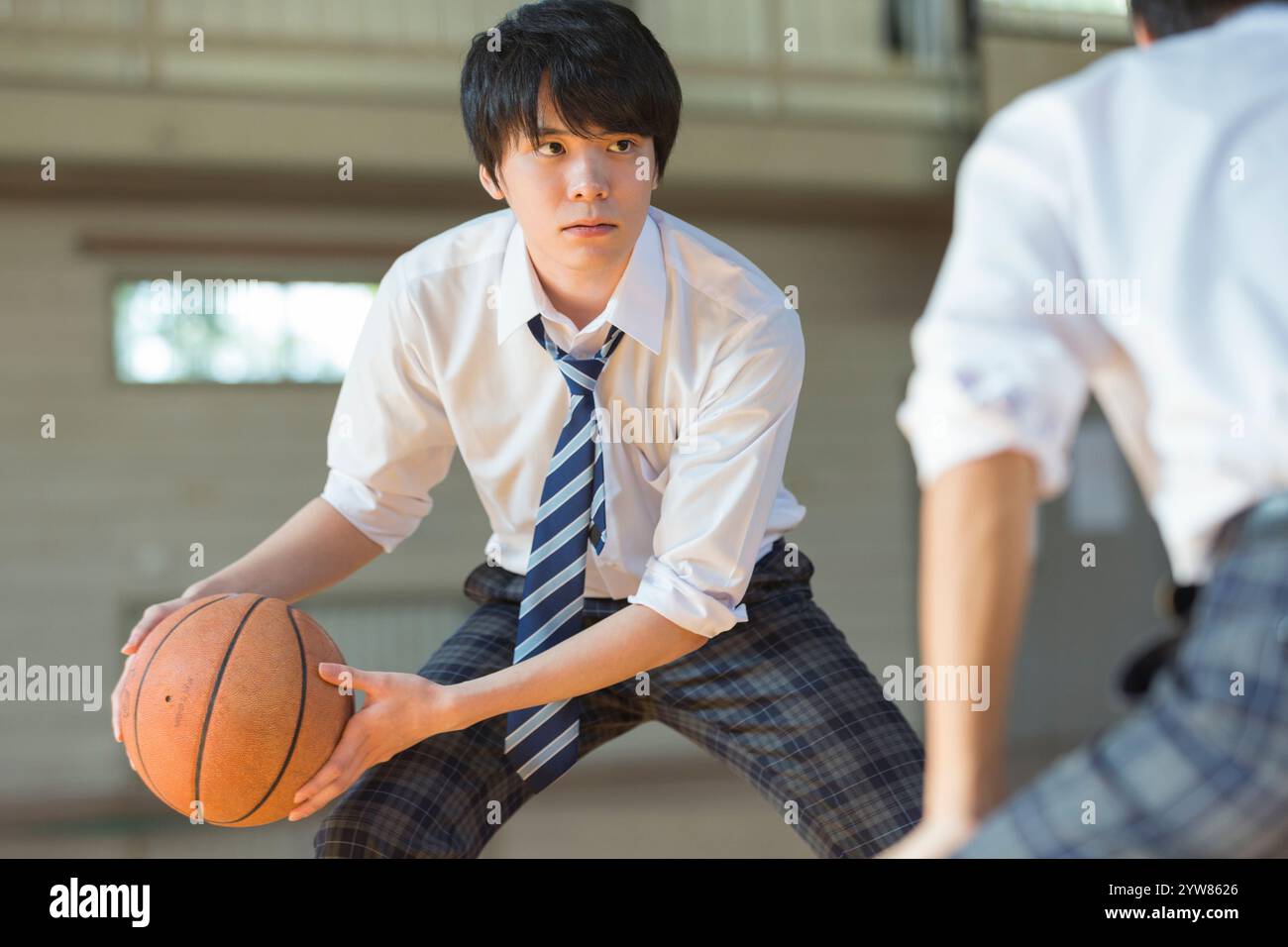 High school boys playing basketball Stock Photo - Alamy