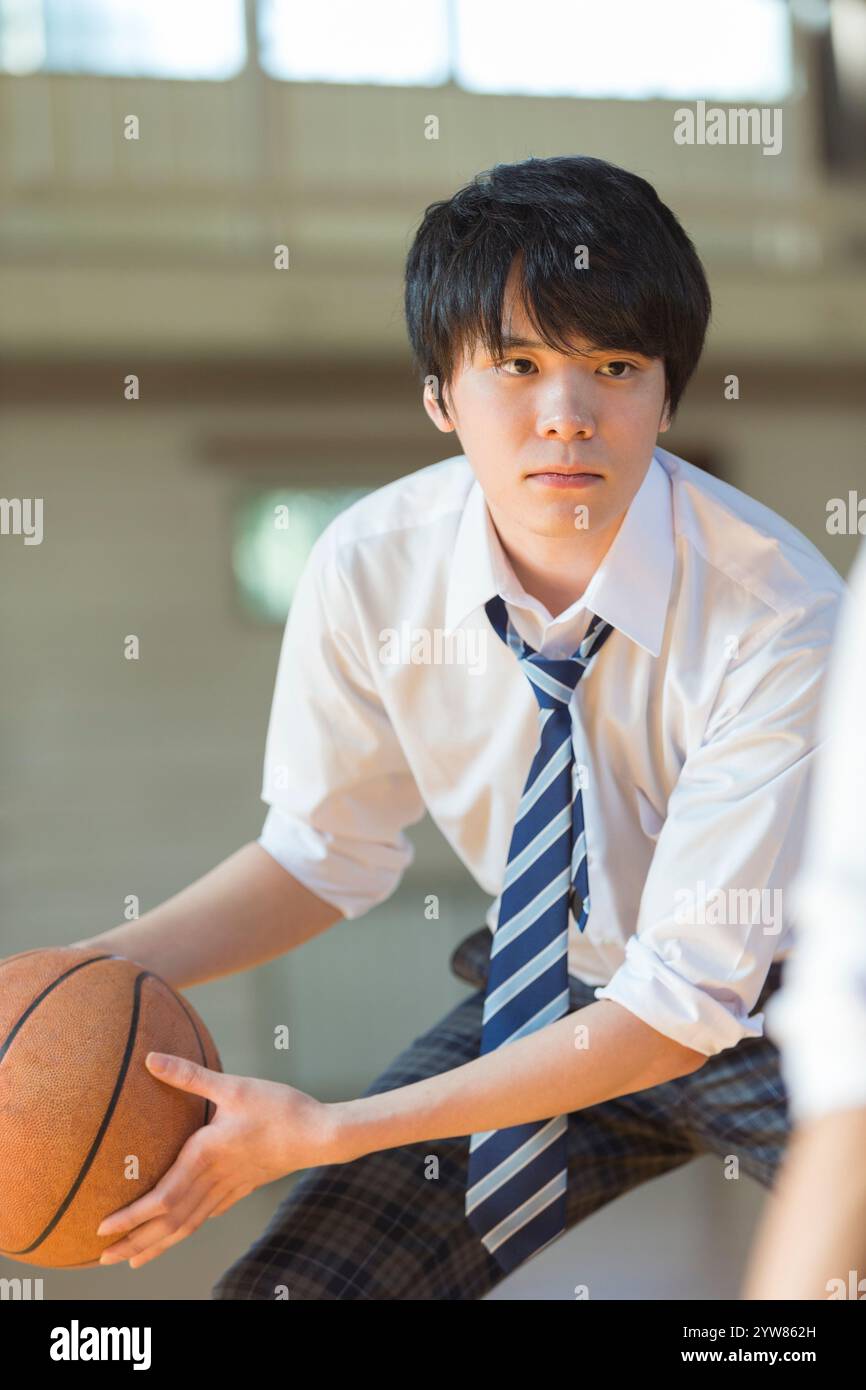 High school boys playing basketball Stock Photo - Alamy