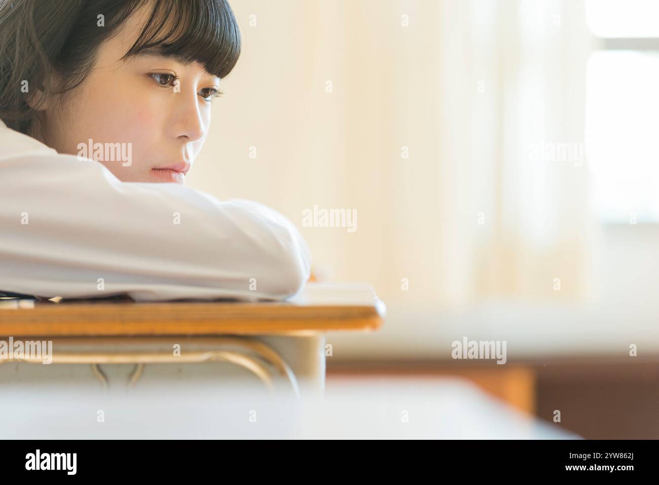 High school girl thinking Stock Photo - Alamy