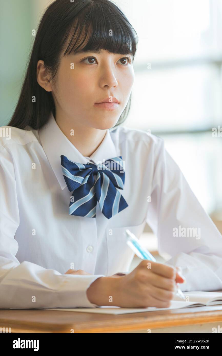 Female high school student studying Stock Photo - Alamy