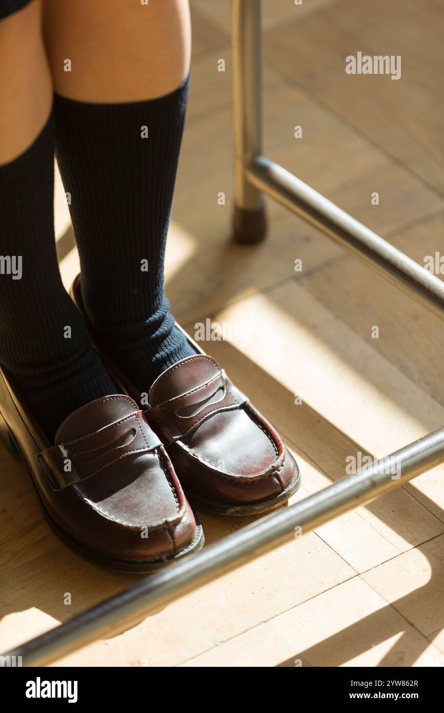 Female high school student's feet Stock Photo - Alamy