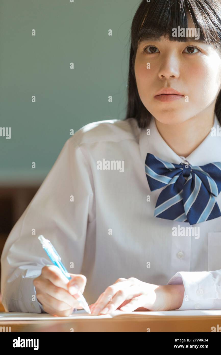 Female high school student studying Stock Photo - Alamy